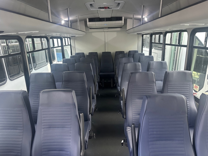 Midsize: Ford E450 Starcraft MVP (#23435) - Carpenter Bus