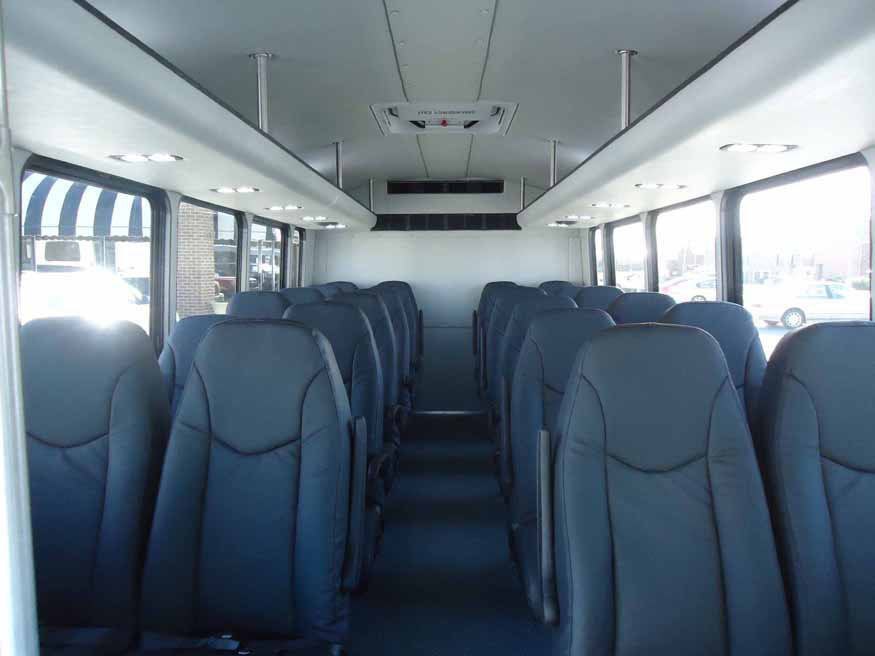 Midsize: Ford E450 Starcraft MVP (#25029) - Carpenter Bus